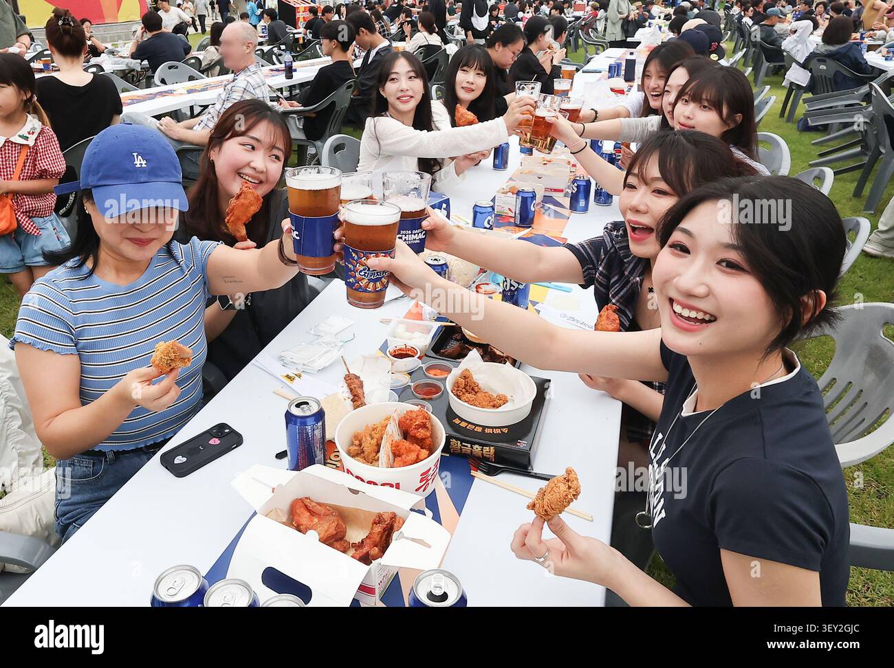 'Chimaek' fete in S. Korean city People make a toast during a "chimaek ...