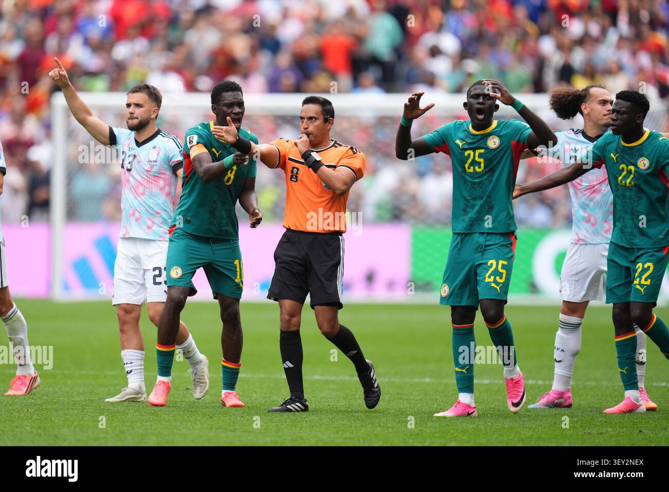 Referee Said Martinez, of Honduras, pints to the penalty kick after ...
