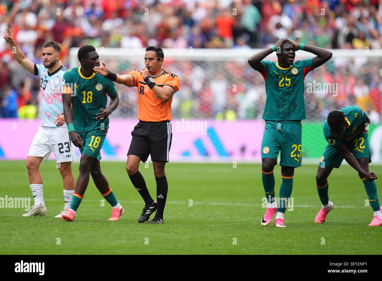 Referee Said Martinez, of Honduras, pints to the penalty kick after ...