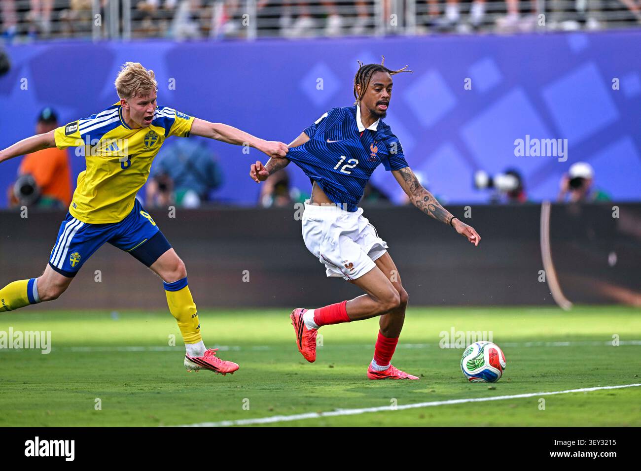 Sweden's Daniel SVENSSON and France's Bradley BARCOLA during the FIFA ...