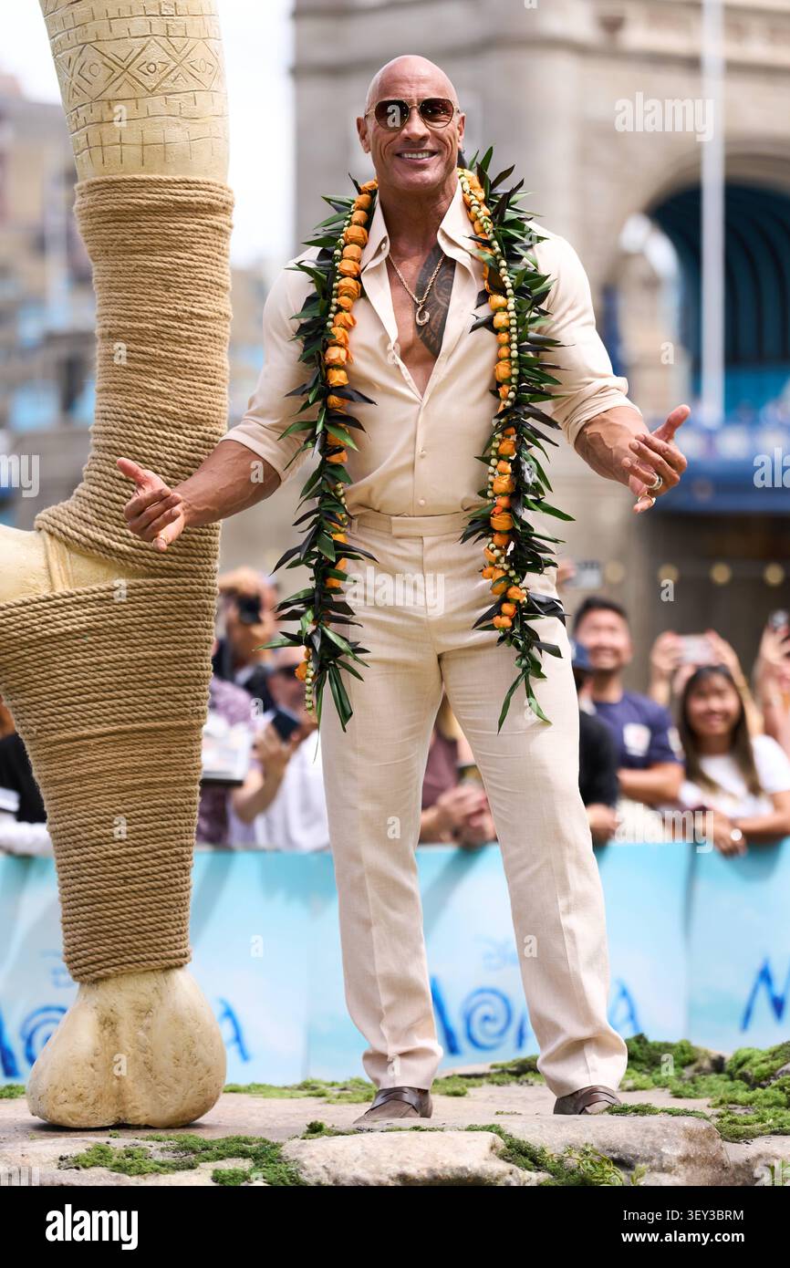 Dwayne Johnson poses for photographers at the "Moana Experience" in ...