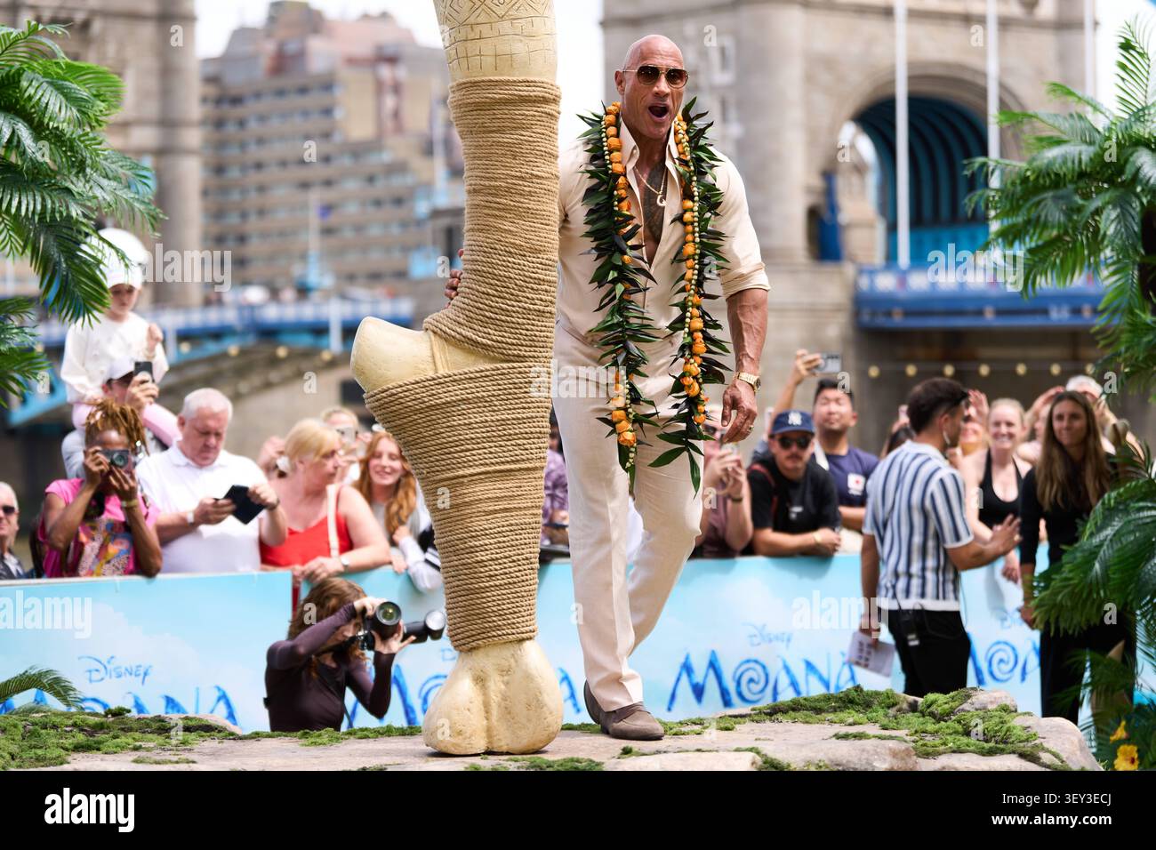 Dwayne Johnson poses for photographers at the "Moana Experience" in ...