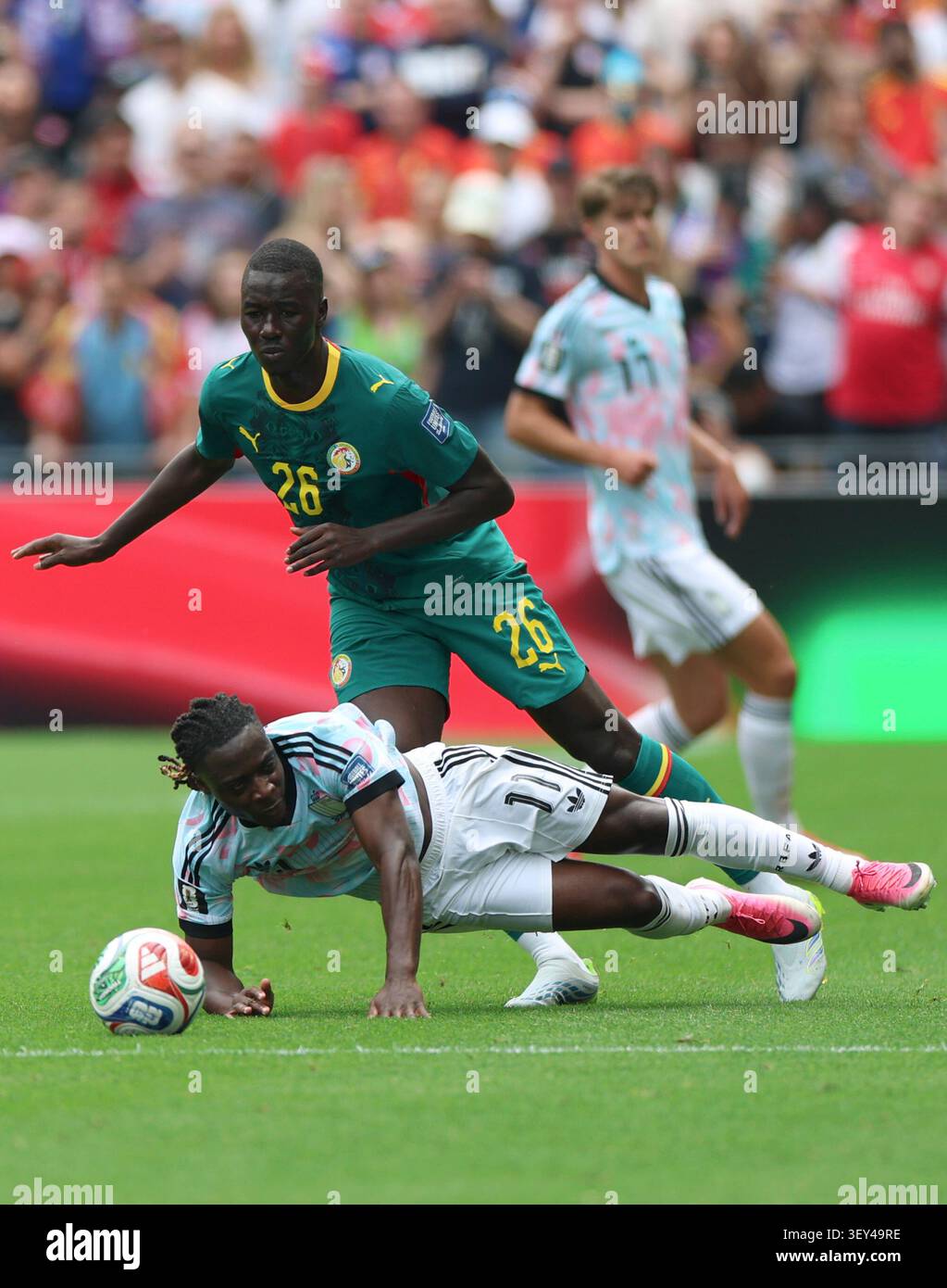 (260702) -- SEATTLE, July 2, 2026 (Xinhua) -- Jeremy Doku (bottom) of ...
