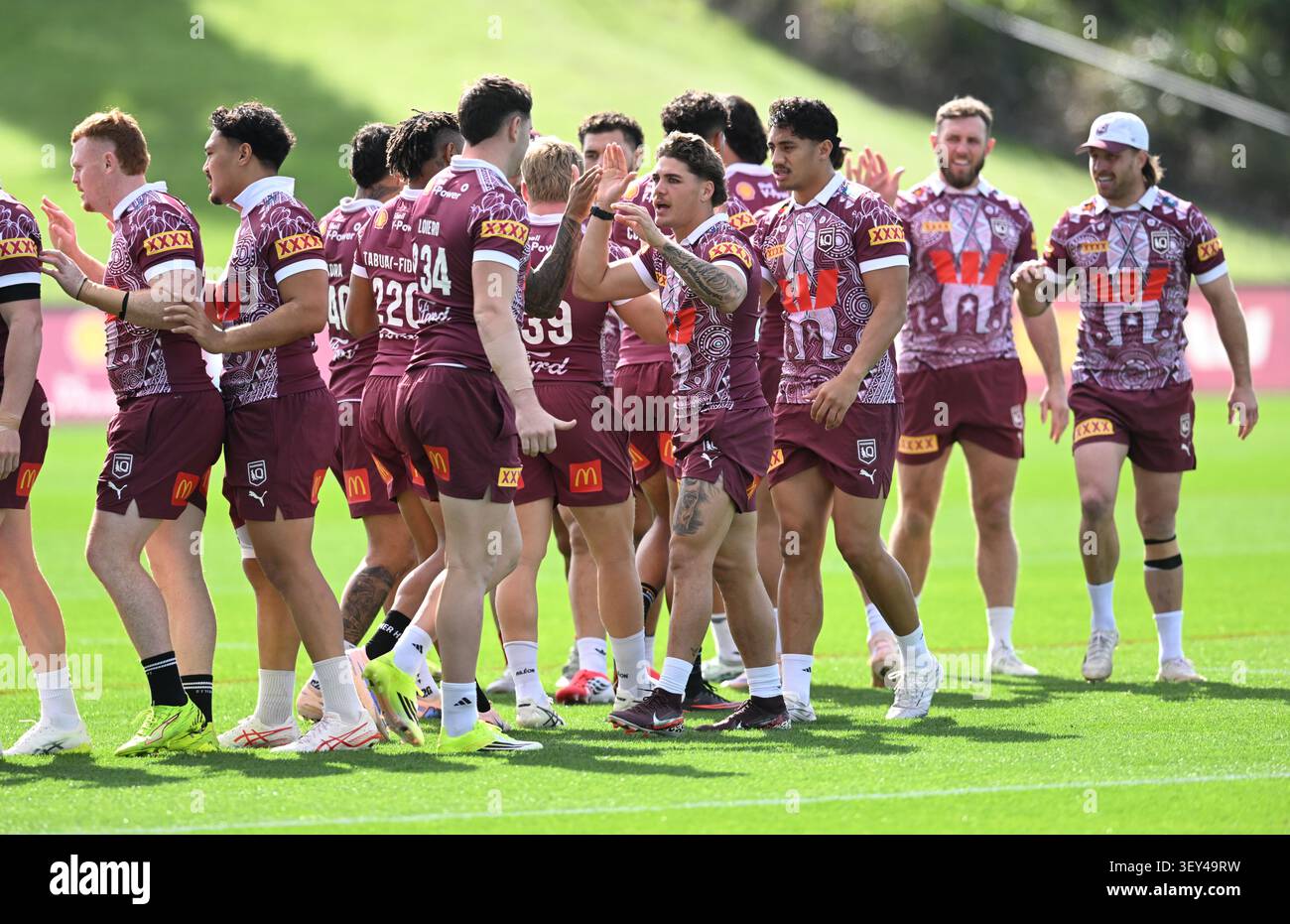 Reece Walsh (centre) is seen with team mates during a Queensland ...