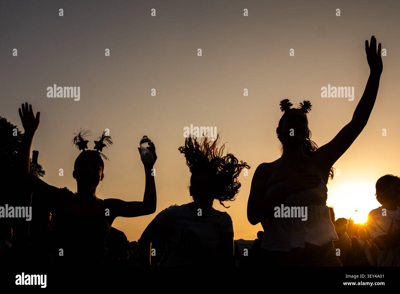 Attendees cheer during a watch party for a World Cup soccer match ...