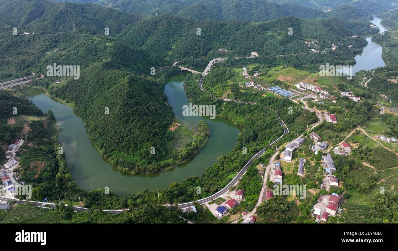 The Malang River winds through mountains in Shiyan, central China's ...