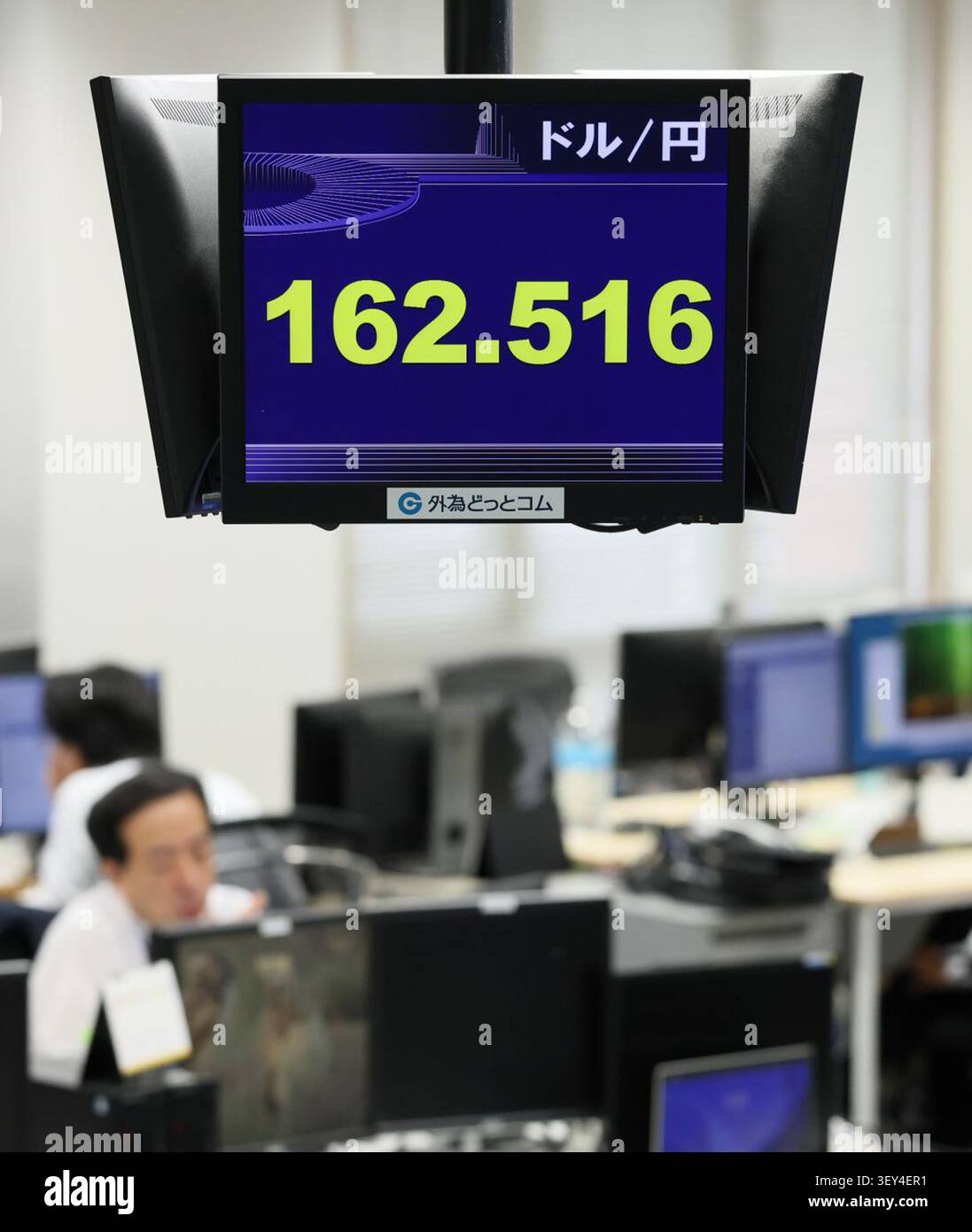 An electronic board displays the current exchange rate of the Japanese ...