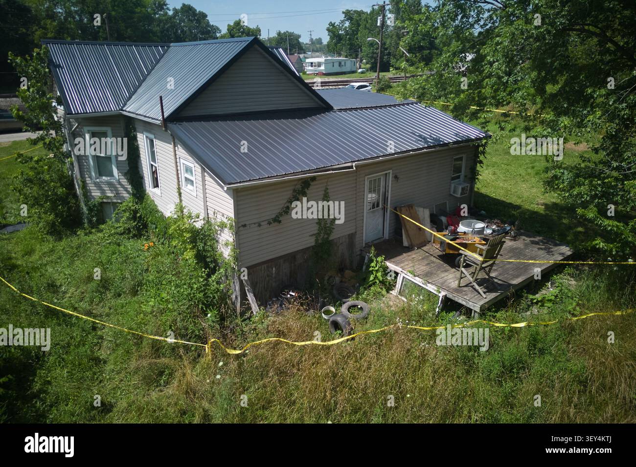 The area behind a home where authorities say they removed 16 children ...