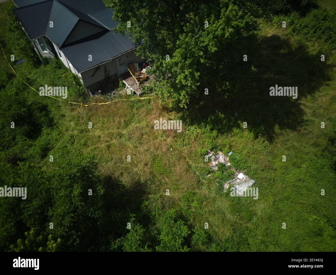 The area behind a home where authorities say they removed 16 children ...