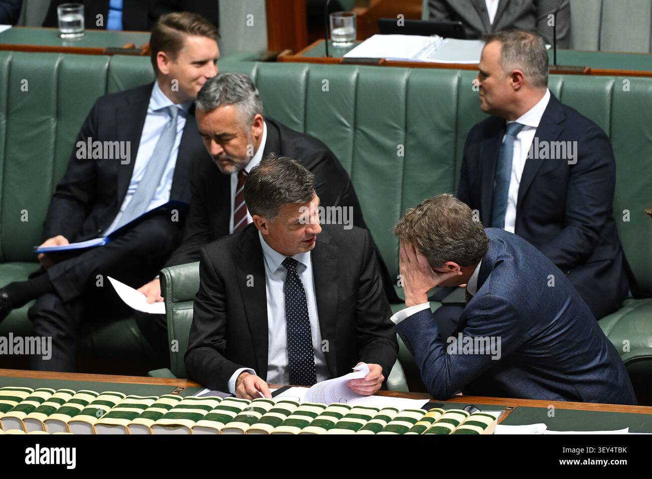 Australian Opposition leader Angus Taylor speaks to the manager of ...