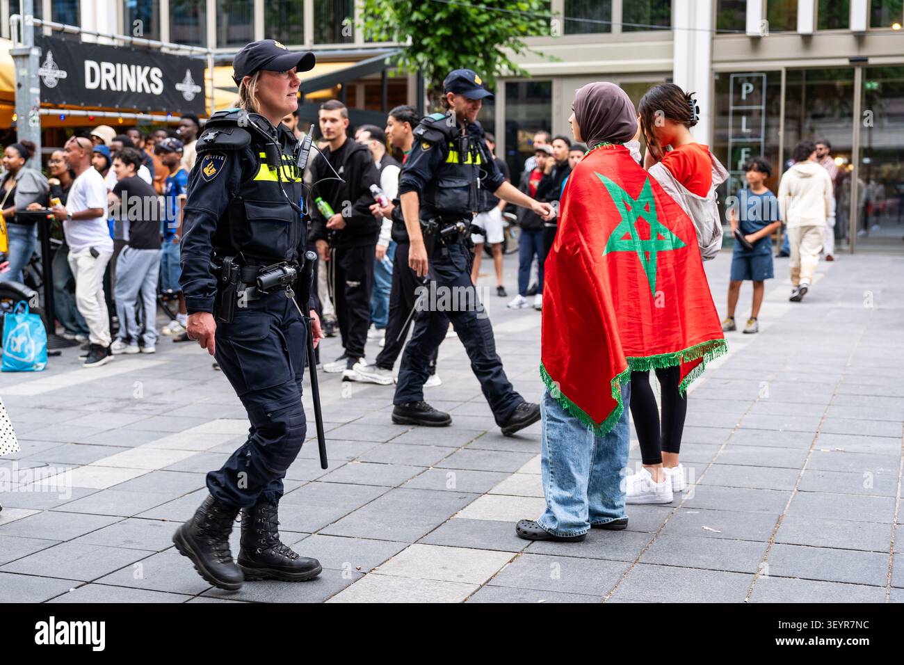 ROTTERDAM - Police monitor Morocco fans watching the match between ...