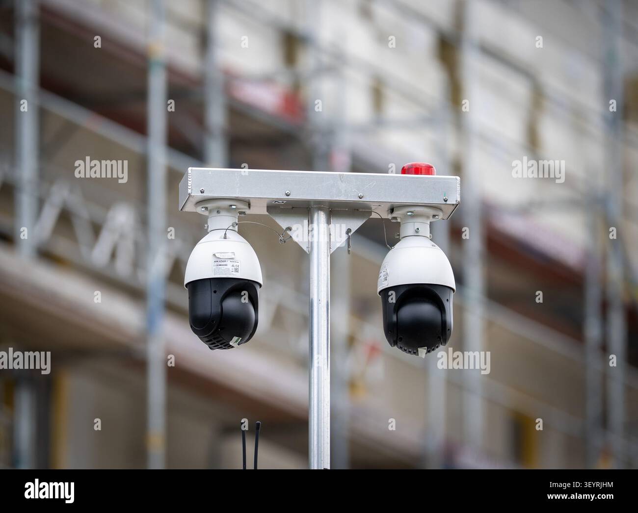 03 July 2026, Berlin: Cameras can be seen at a construction site during ...