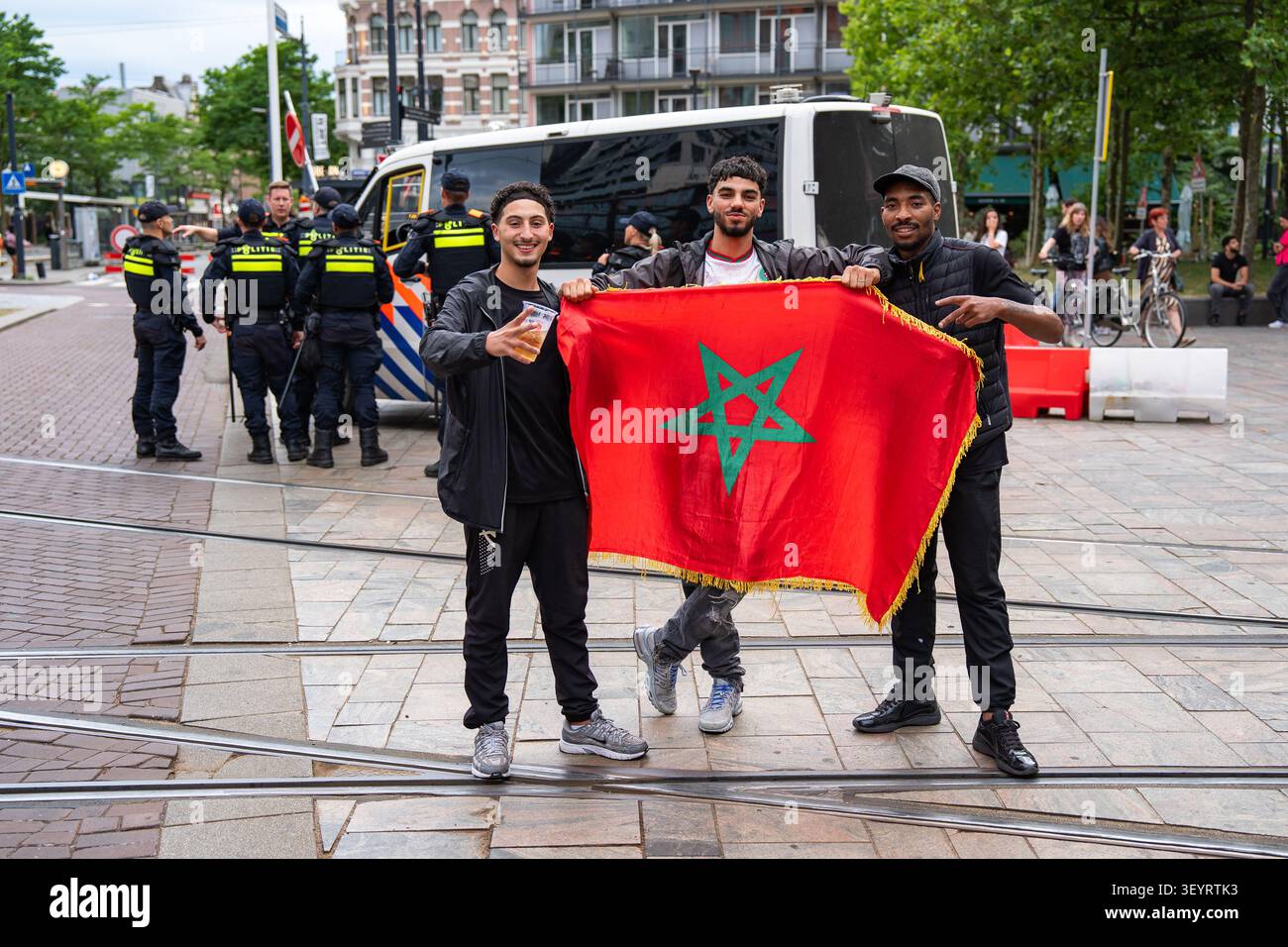 ROTTERDAM - Police monitor Morocco fans watching the match between ...