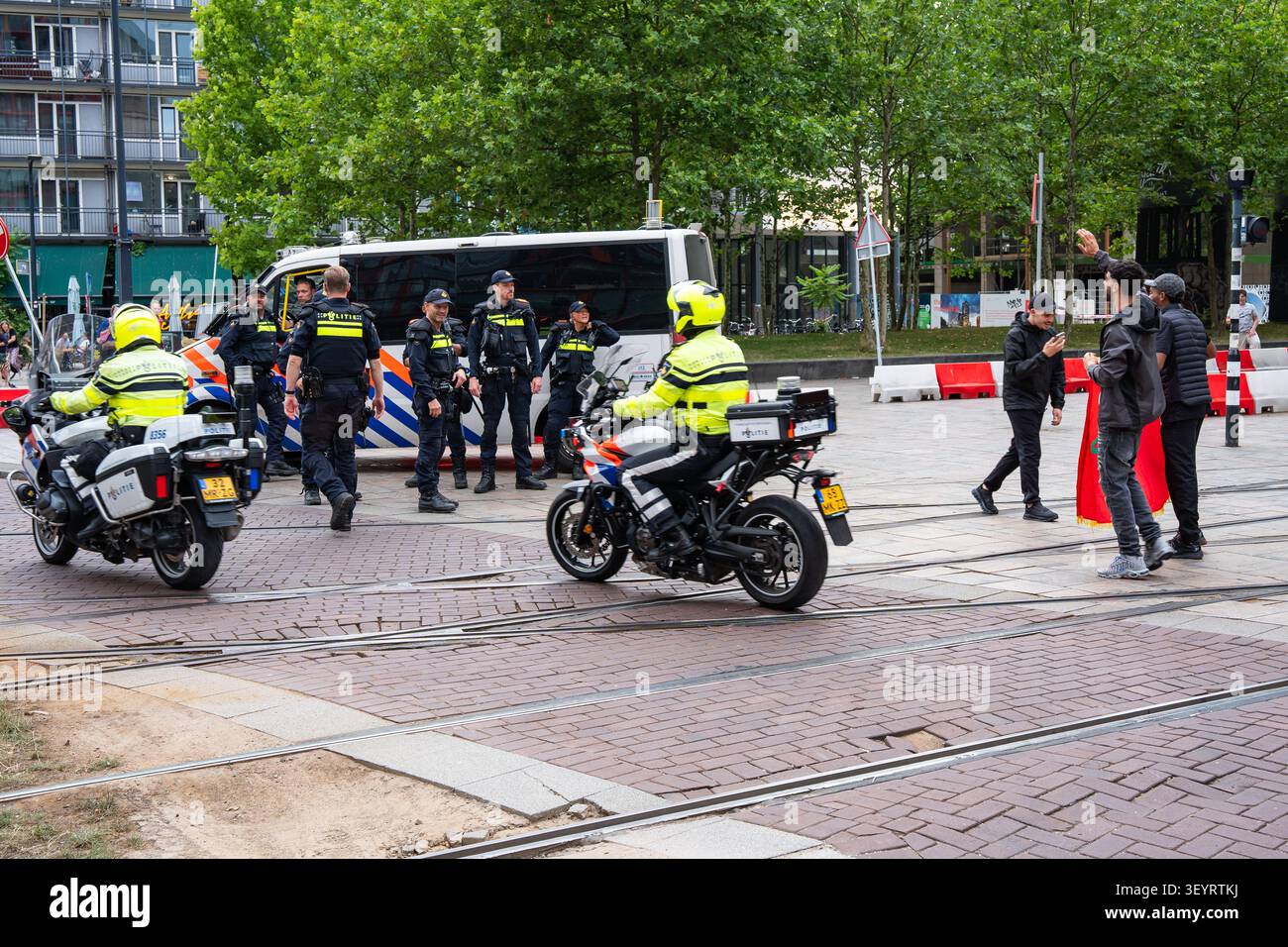 ROTTERDAM - Police monitor Morocco fans watching the match between ...