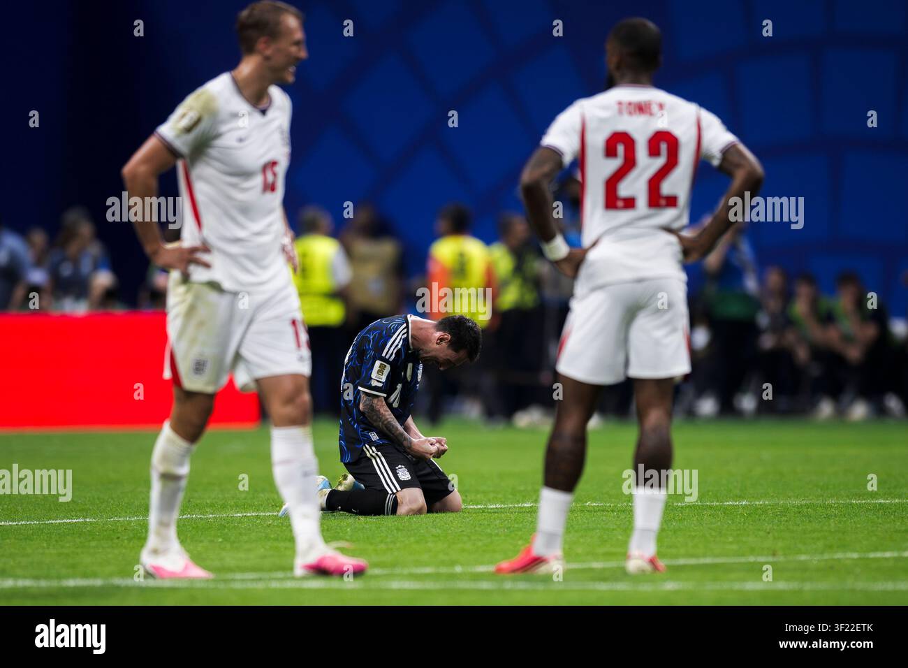Lionel Messi Of Argentina Celebrates As Dan Burn Of England And Ivan lionel-messi-of-argentina-celebrates-as-dan-burn-of-england-and-ivan