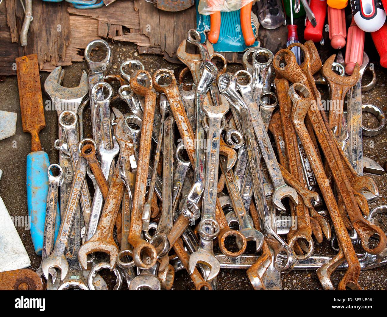 Pile Of Worn Wrenches At A Local Market In Myanmar Showing Repair