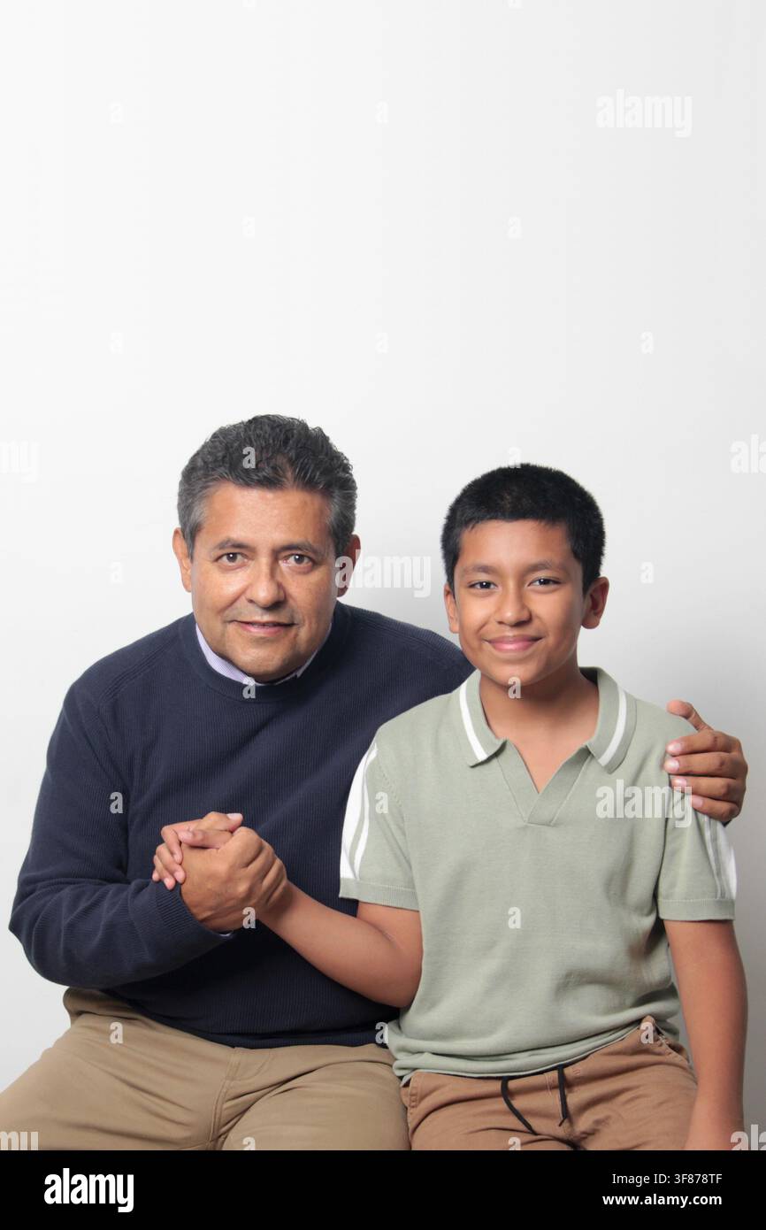 Latino single dad and his 12-year-old Latino son show their love to ...
