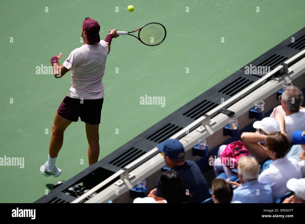 Francisco Cerundolo Of Argentina Returns The Ball To Taylor Fritz Of