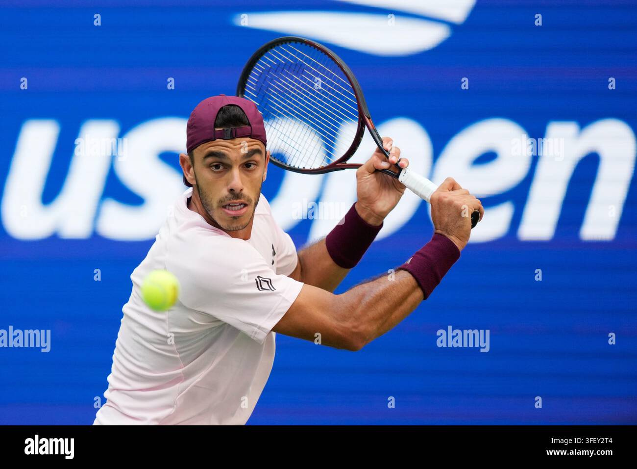 Francisco Cerundolo Of Argentina Returns The Ball To Taylor Fritz Of