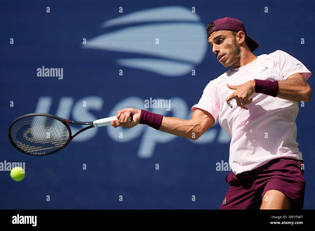 Francisco Cerundolo Of Argentina Returns The Ball To Taylor Fritz Of