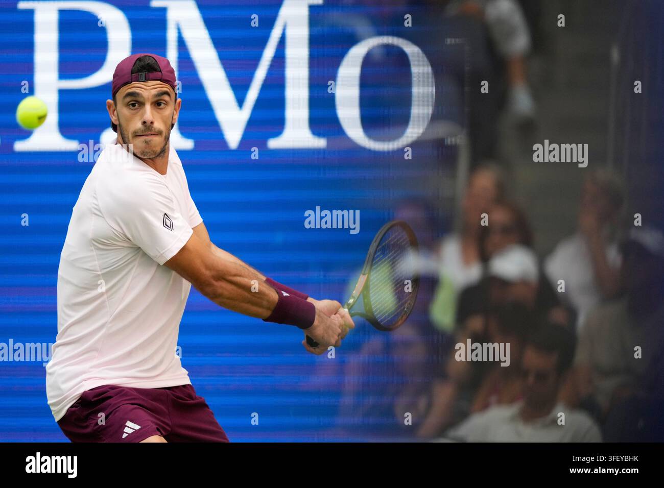 Francisco Cerundolo Of Argentina Returns The Ball To Taylor Fritz Of