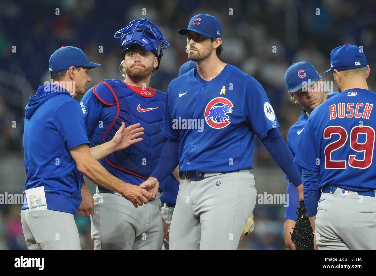 Chicago Cubs manager Craig Counsell relieves pitcher Clay Holmes in the ...