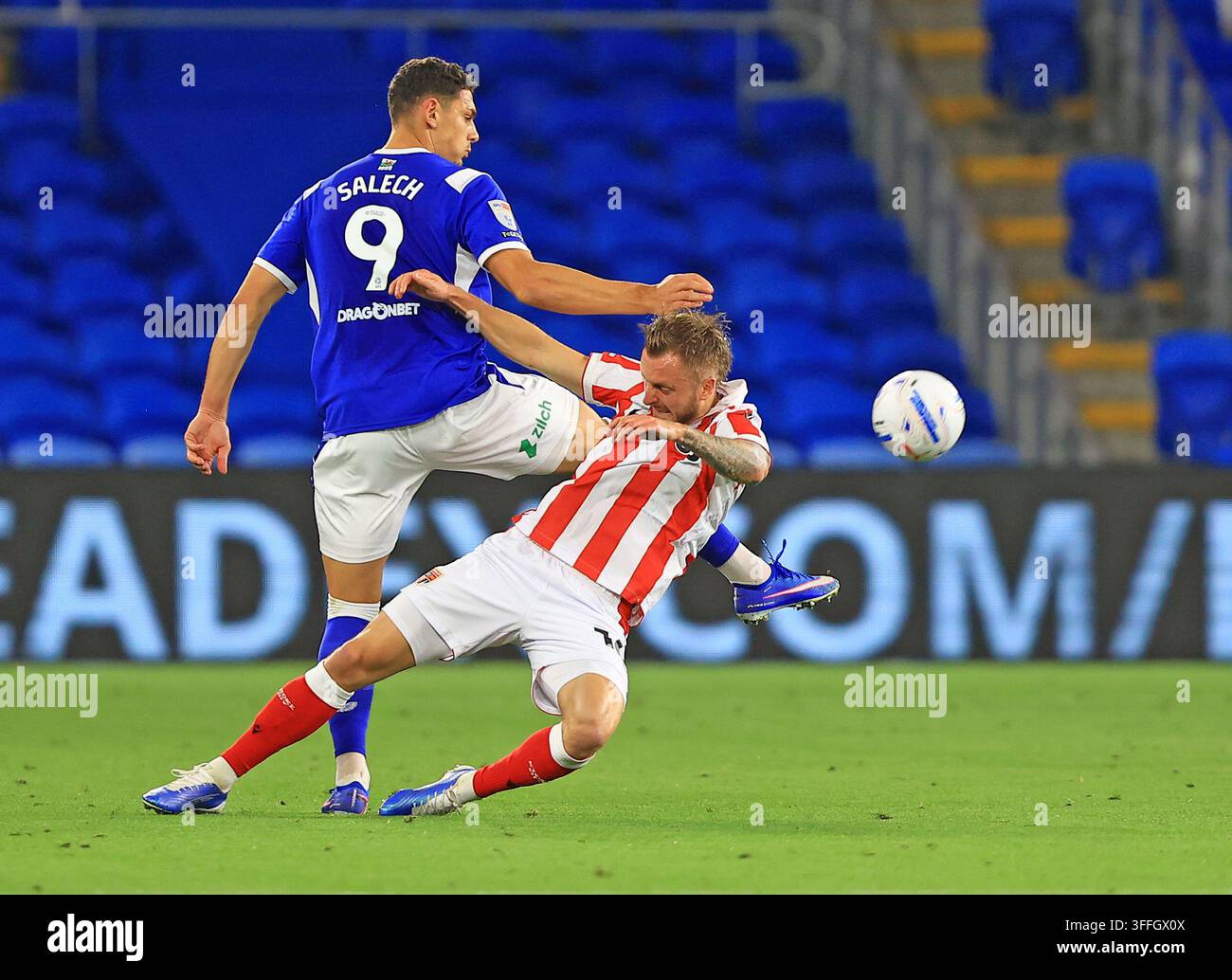 Stoke City's Ben Wilmot battles with Cardiff City's Yousef Salech in ...