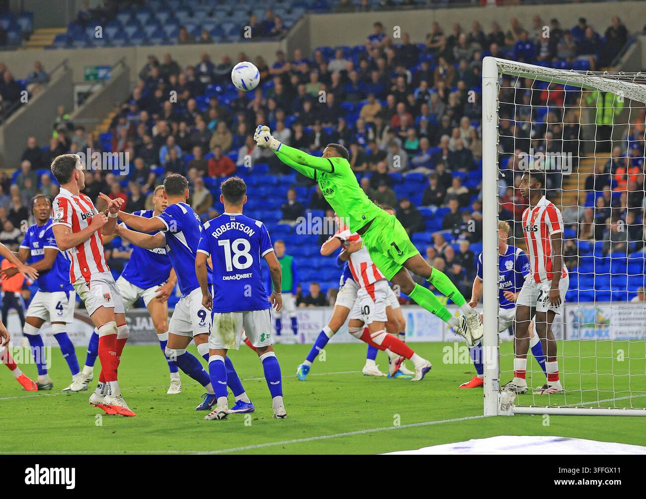 Cardiff City goalkeeper Nathan Trott punches clear in the match at The ...