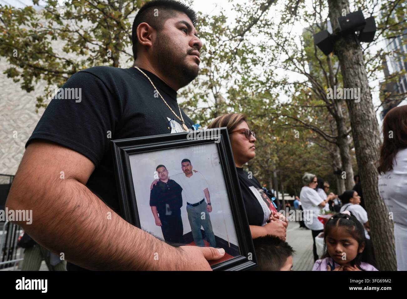 Juan Lopez Who Lost Father Leobardo Looks On During A Ceremony