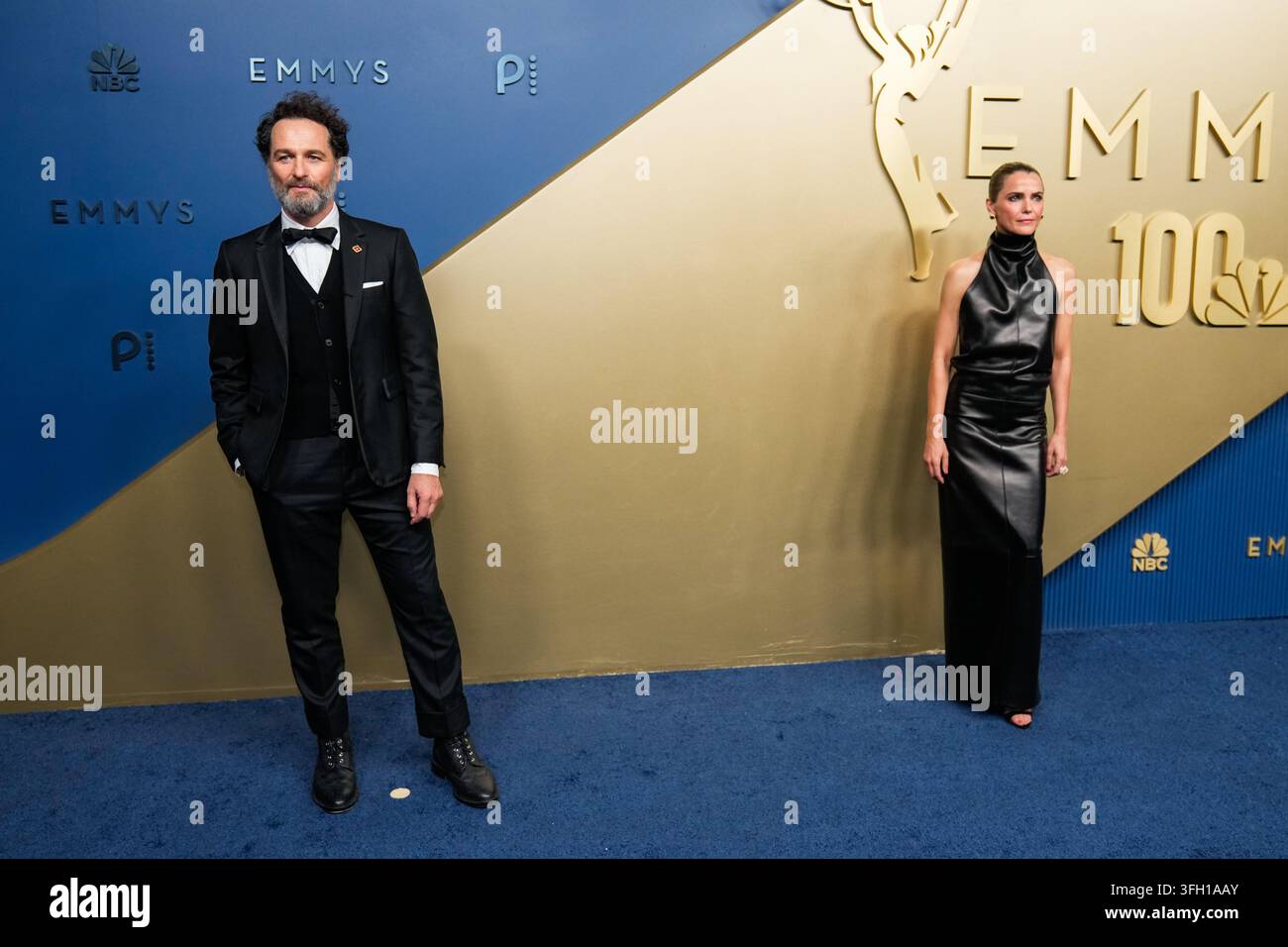Matthew Rhys Left And Keri Russell Arrive At The 78th Emmy Awards On