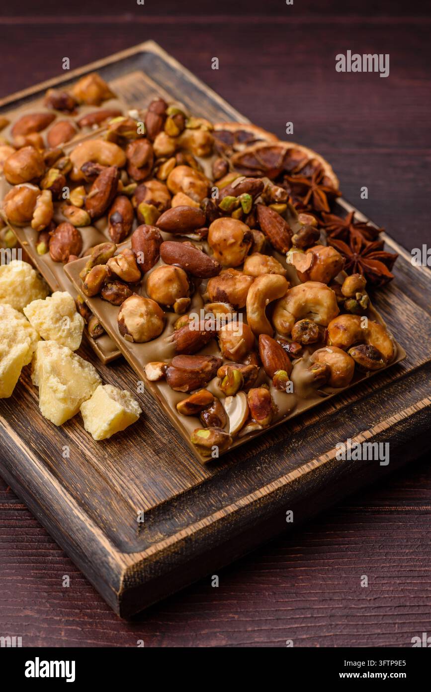 A bar of sugar free white chocolate with pistachios, almonds, and ...