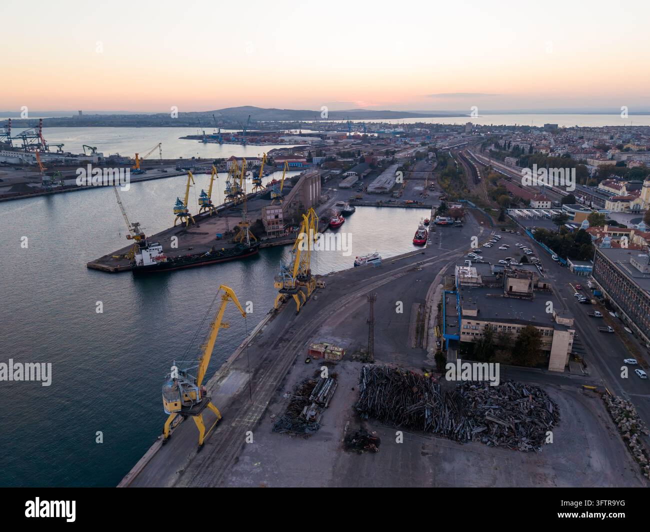 Aerial view of the Port of Burgas with industrial cranes, cargo ships ...