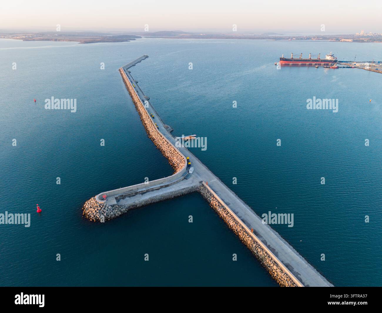 Aerial view of the Port of Burgas with its long stone breakwater ...