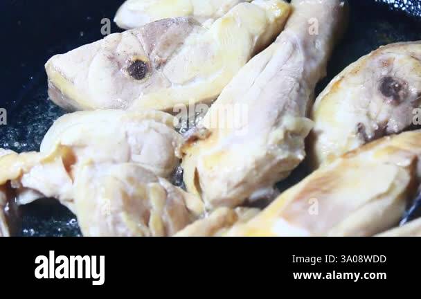 cook less fried chicken Stock Video Footage - Alamy