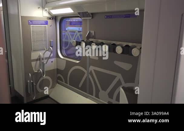 Modern double-decker commuter train in Switzerland with bike-friendly ...