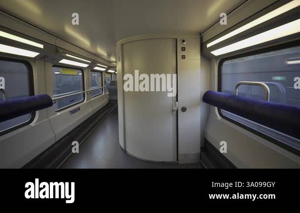 Modern and spacious train restroom in Swiss intercity train. Designed ...