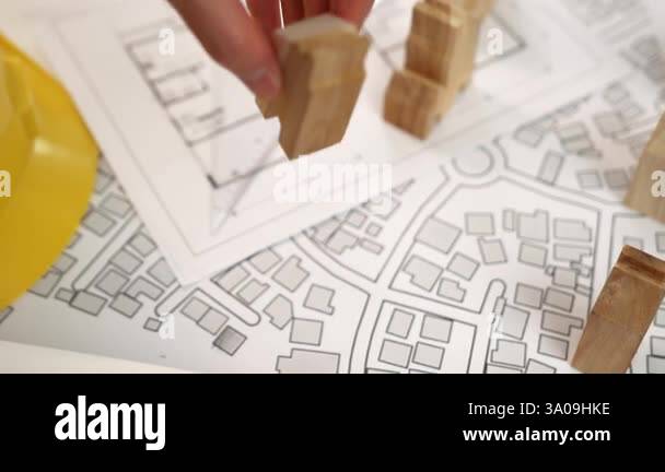 Video of engineer with yellow helmet on table use scale ruler to ...