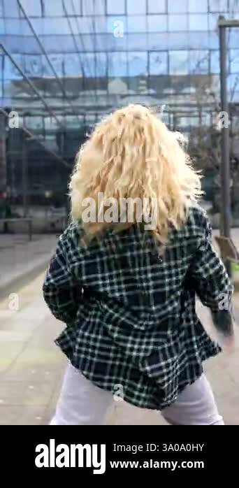 Vibrant young dancer performing dynamic urban choreography, expressing ...