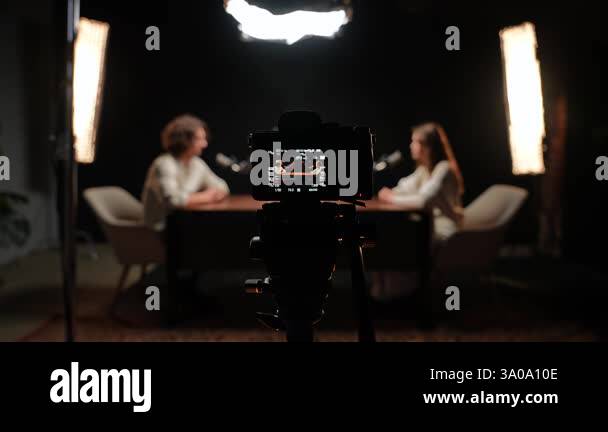 Backstage. Two influencers engage in a thought-provoking interview in a ...