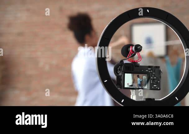 Rear view behide camera screen recording woman influencer shoot live ...