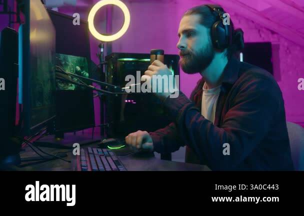 Frustrated pensive Caucasian influencer man thinking gamer talking ...