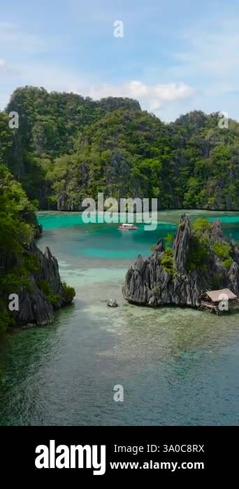 Splendid limestone rocks formation in tropical island. Hidden lagoon in ...