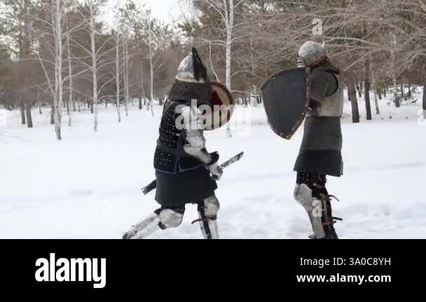 Battle of two medieval warriors. Fight of a knight and a Central Asian ...