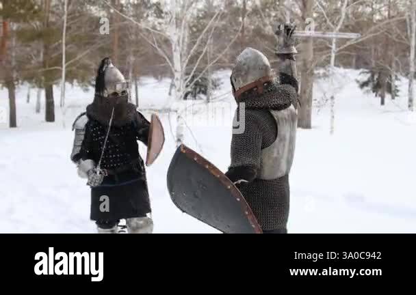 Battle of two medieval warriors. Fight of a knight and a Central Asian ...