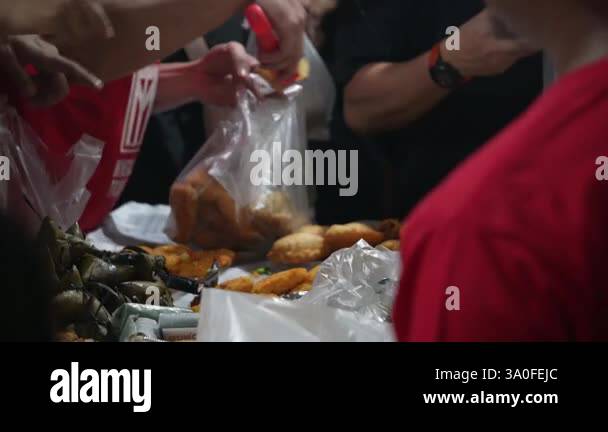 March 2, 2025. Jakarta, Indonesia. The atmosphere of the market selling cakes, food, and drinks ...