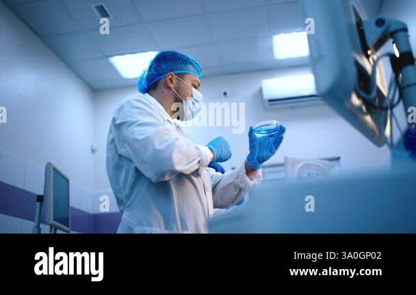 Research scientists work in a laboratory with modern equipment ...