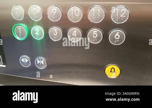 Close-up of a modern elevator's floor selection panel, featuring ...