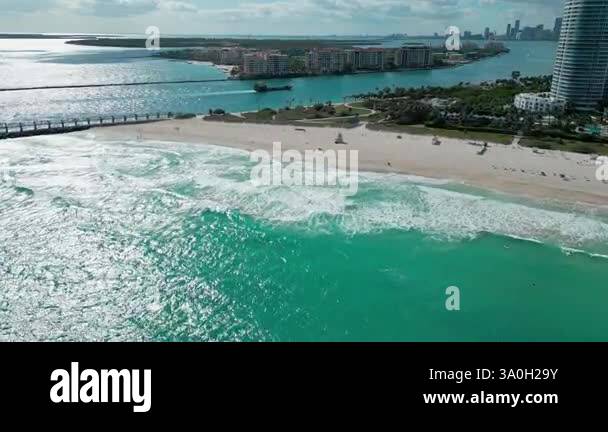 Miami south beach aerial view. Sea beach coastline. Cargo ship entering ...