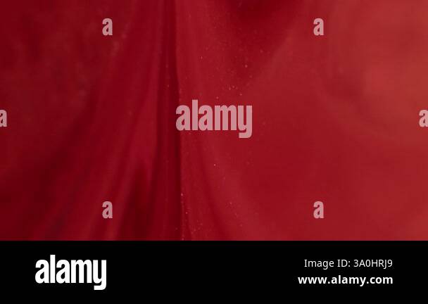 Red overflow. Acrylic spill. Art liquid mix with stone texture ...