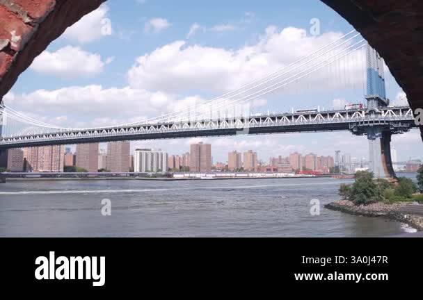 New York City Manhattan Bridge to Brooklyn Dumbo. View from waterfront ...